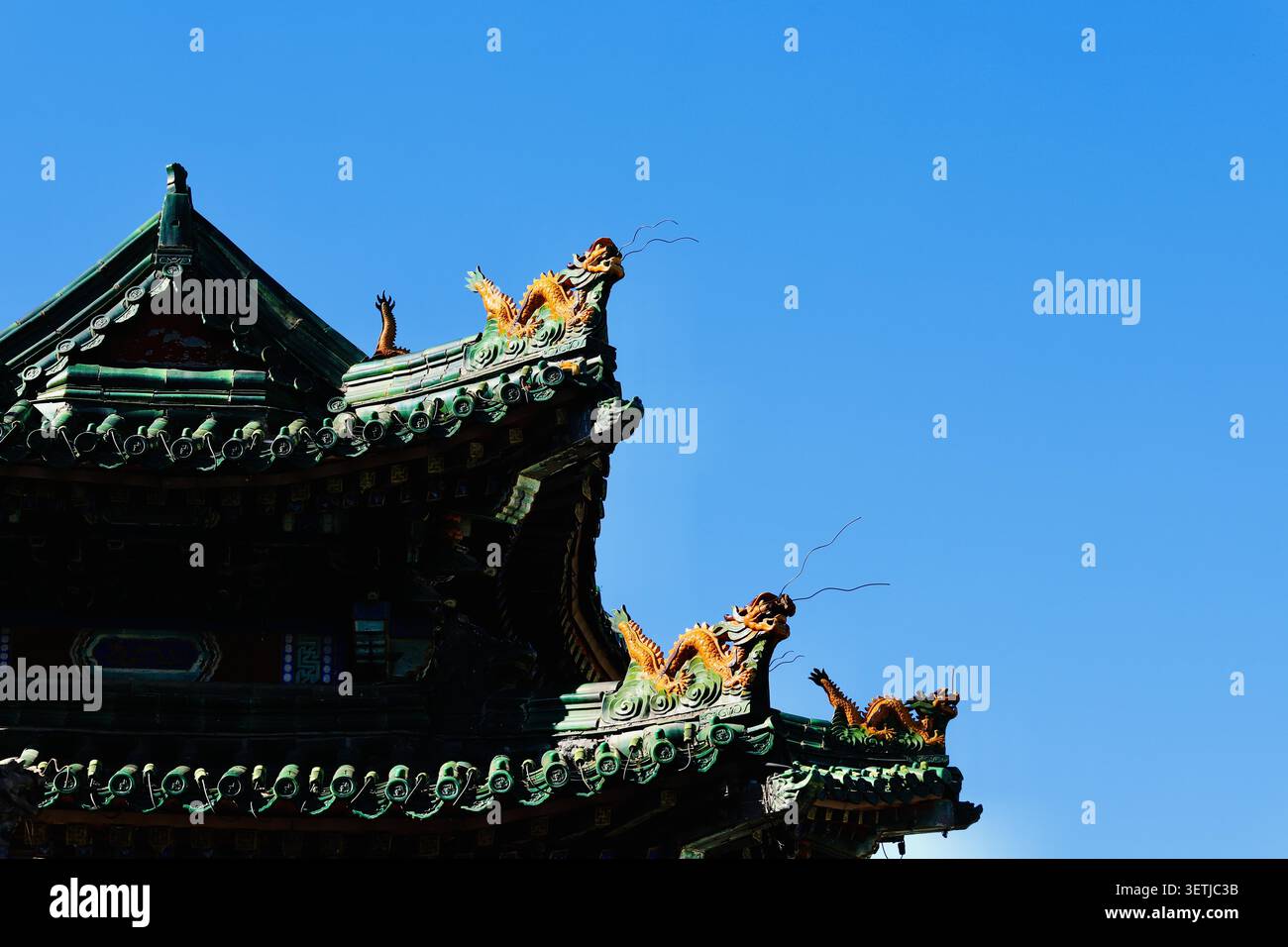 Visitors enjoy boating in Longtan Park with a view of China Zun in ...