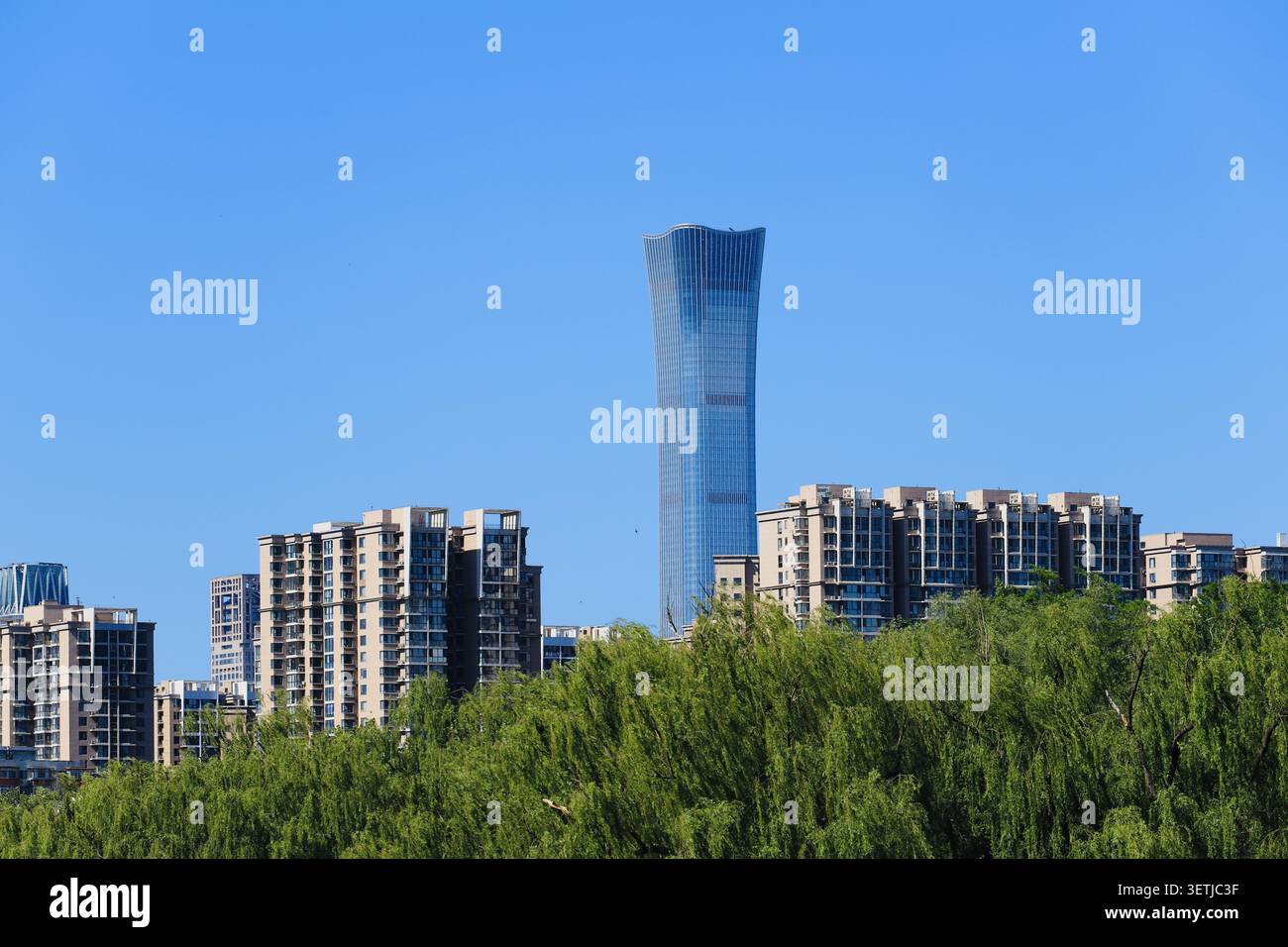 Visitors enjoy boating in Longtan Park with a view of China Zun in ...