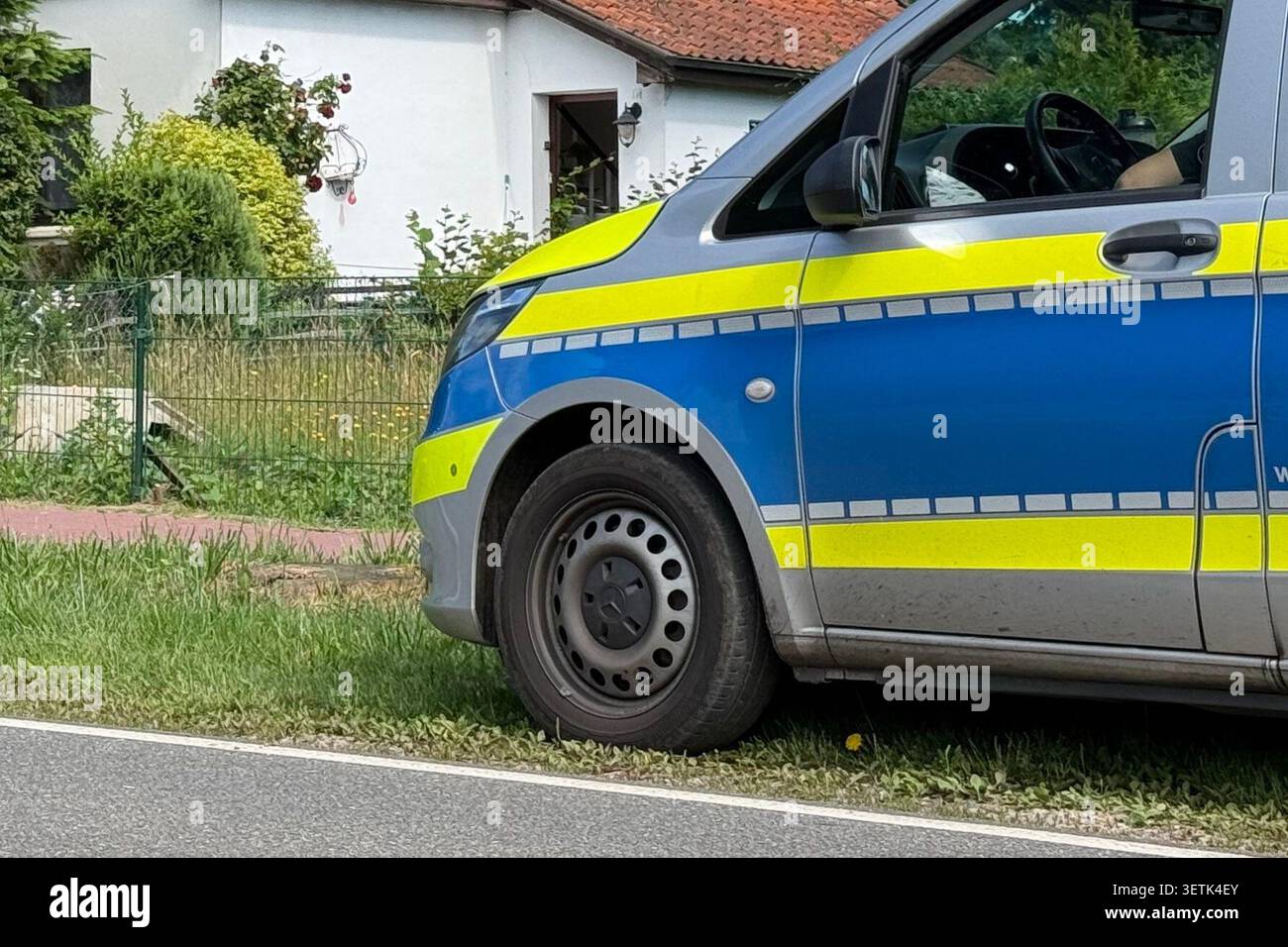 23 June 2026, Schleswig-Holstein, Oststeinbek: A police car is parked ...