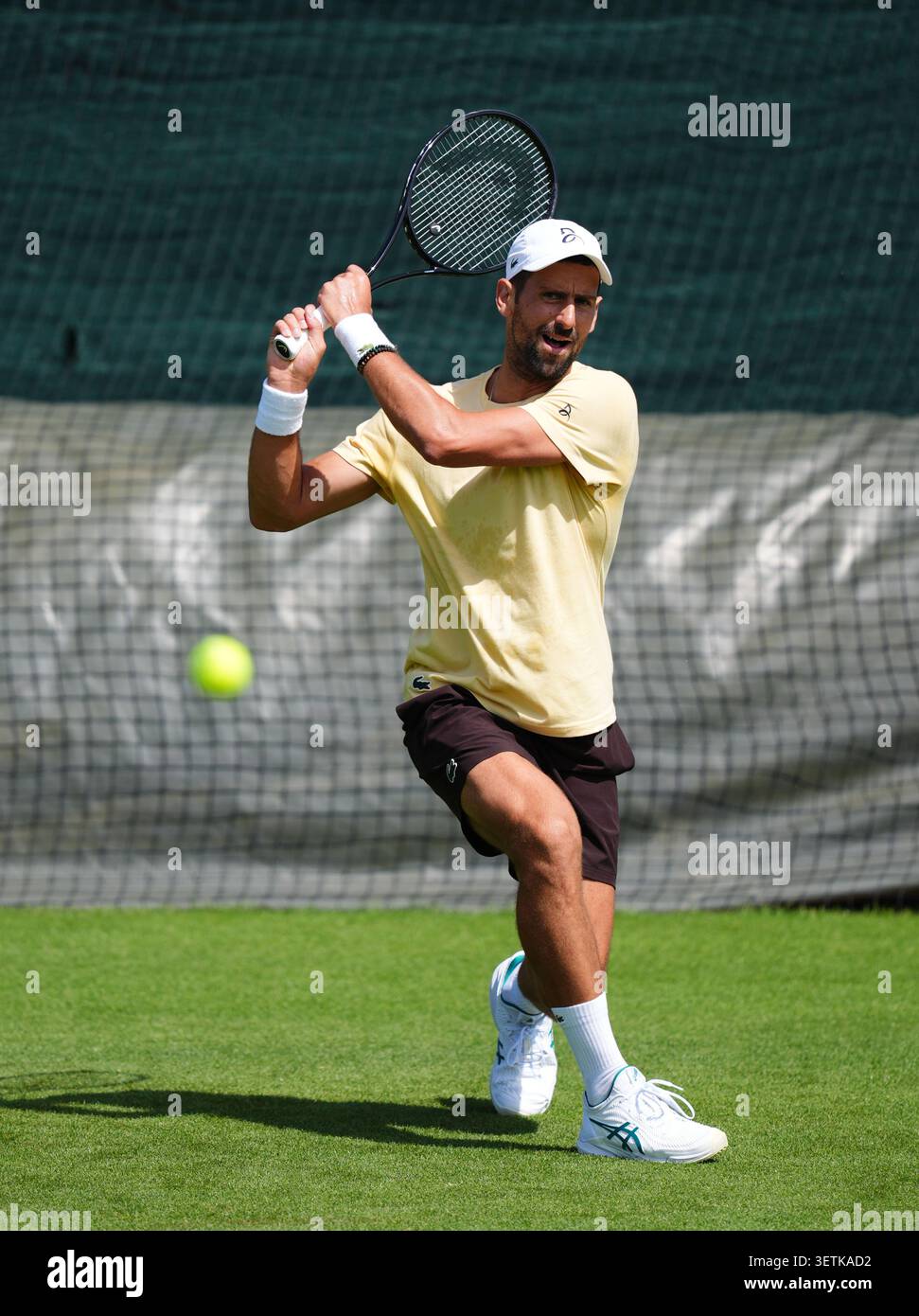 Novak Djokovic or Serbia arriving at the practice courts during a ...