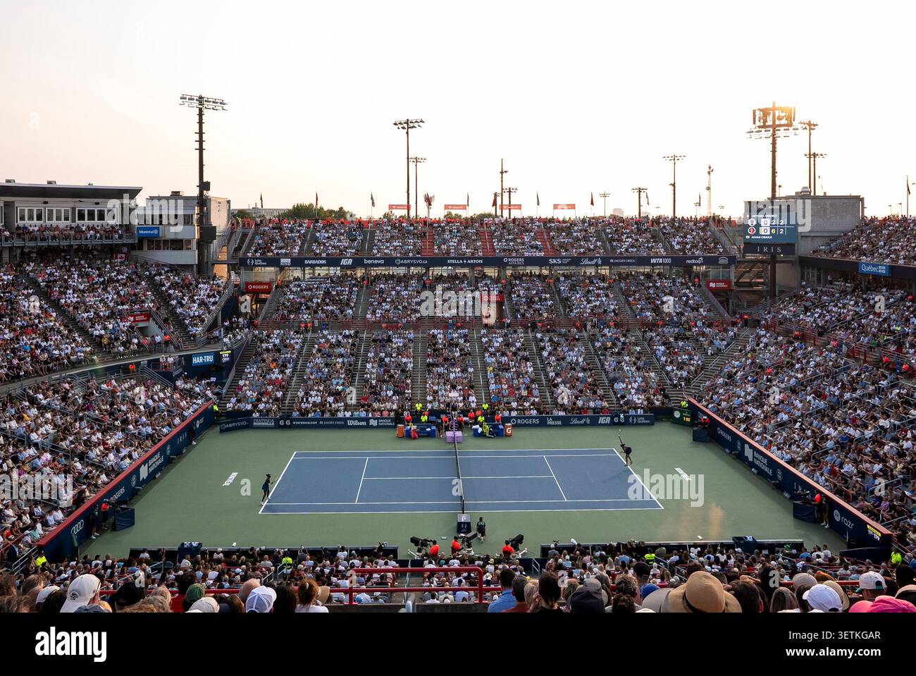 Naomi Osaka of Japan, right, serves during finals tennis action against ...