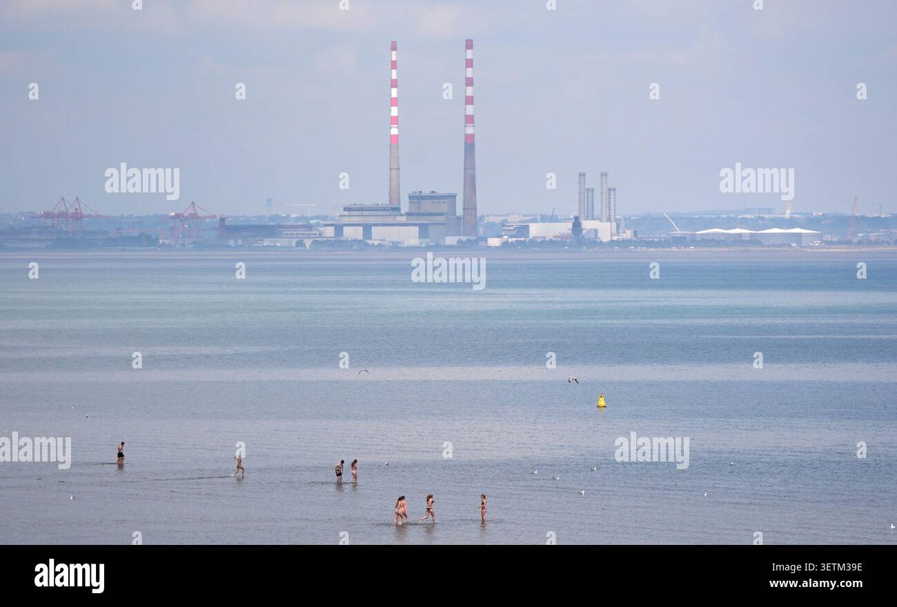 Sunbathers at Seapoint in Dun Laoghaire co Dublin. There is a risk of ...