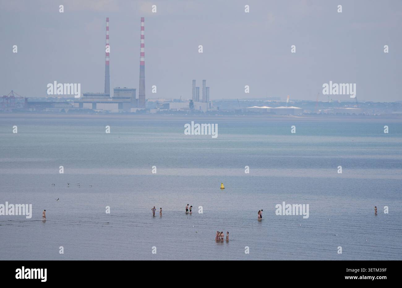 Sunbathers at Seapoint in Dun Laoghaire co Dublin. There is a risk of ...
