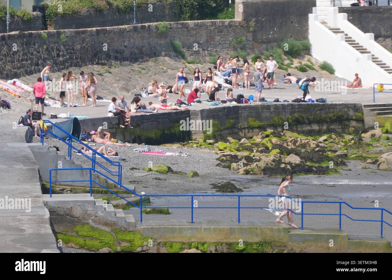 Sunbathers at Seapoint in Dun Laoghaire co Dublin. There is a risk of ...