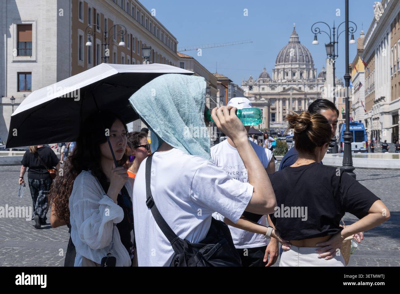 IPA85973477 - Tourists waiting in line at a water dispenser in Piazza ...