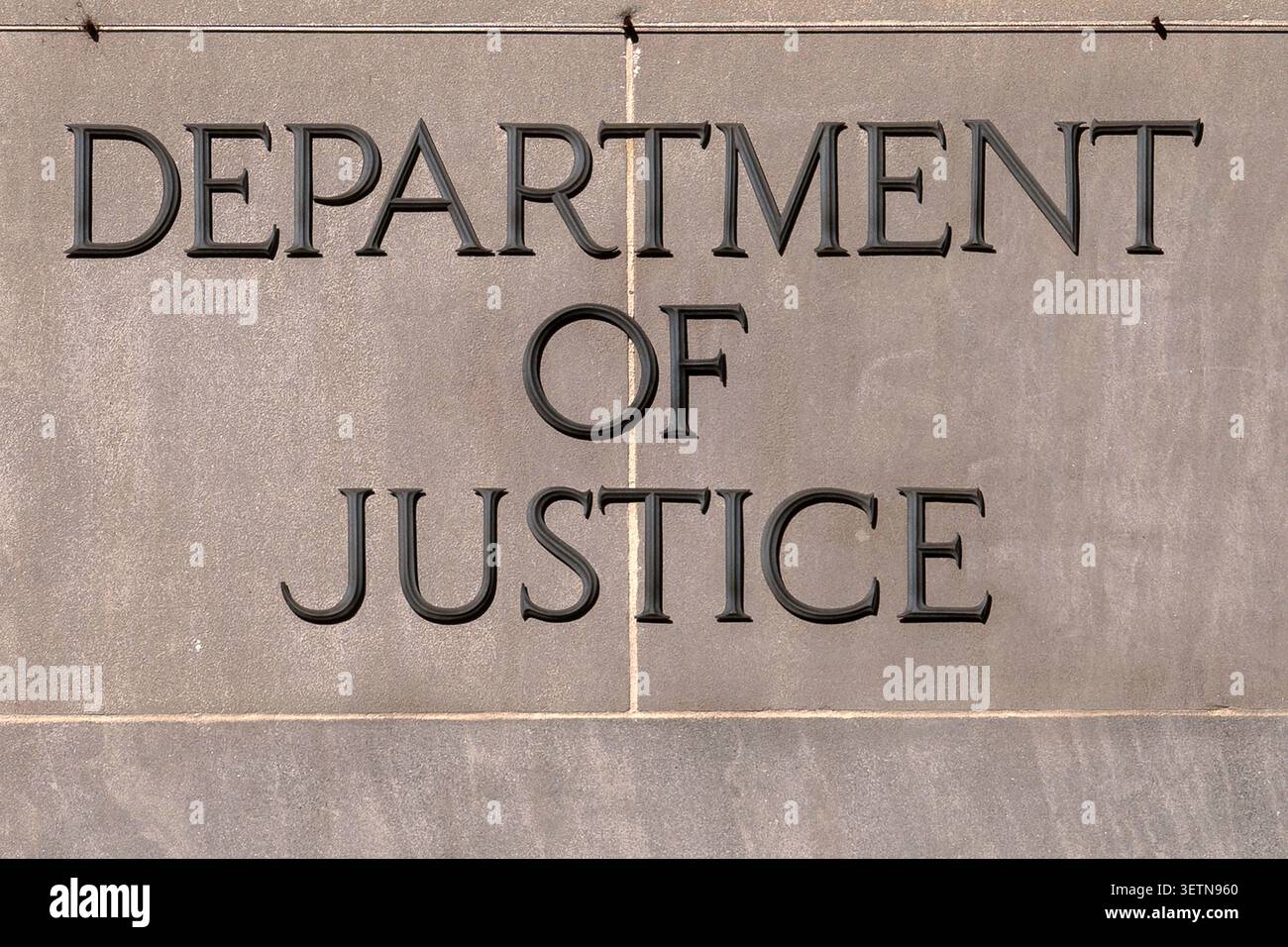 FILE - A sign of the U.S. Department of Justice is seen on the ...