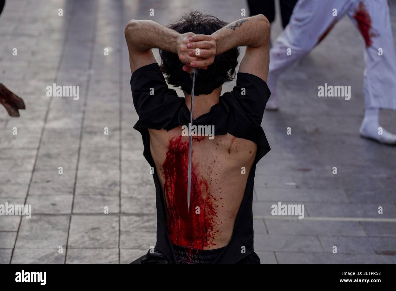 EDS NOTE: GRAPHIC CONTENT - Shiite faithful pilgrims flagellate ...