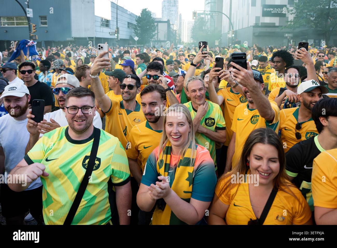 Australia fans march to the entrance of B.C. Place before the first ...