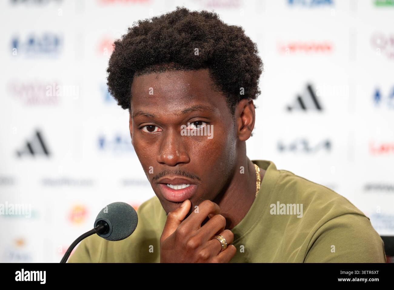 Canada's Jonathan David speaks during a FIFA World Cup press conference ...