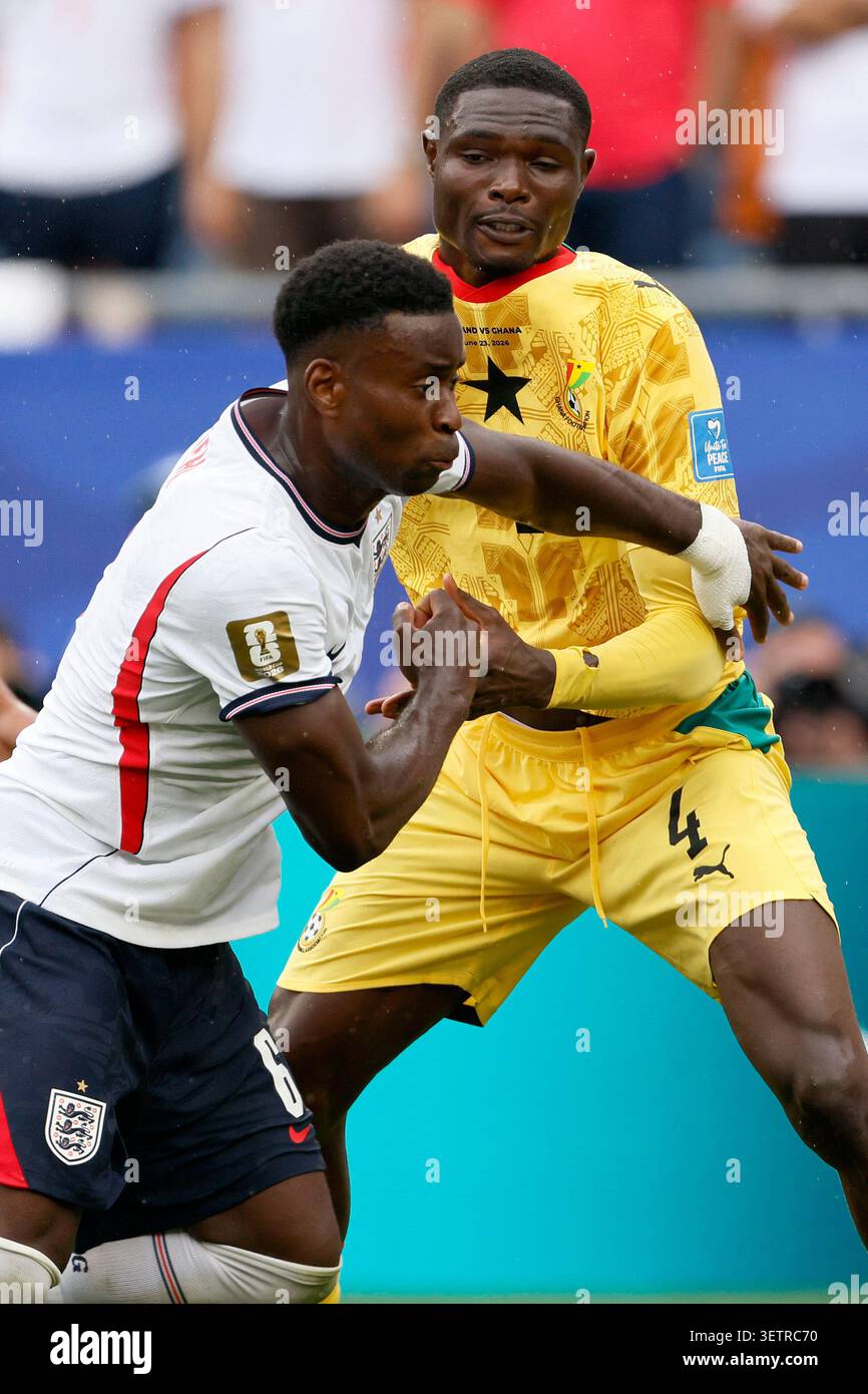 Marc Guehi Of England And Jonas Adjetey Of Ghana Challenge During The
