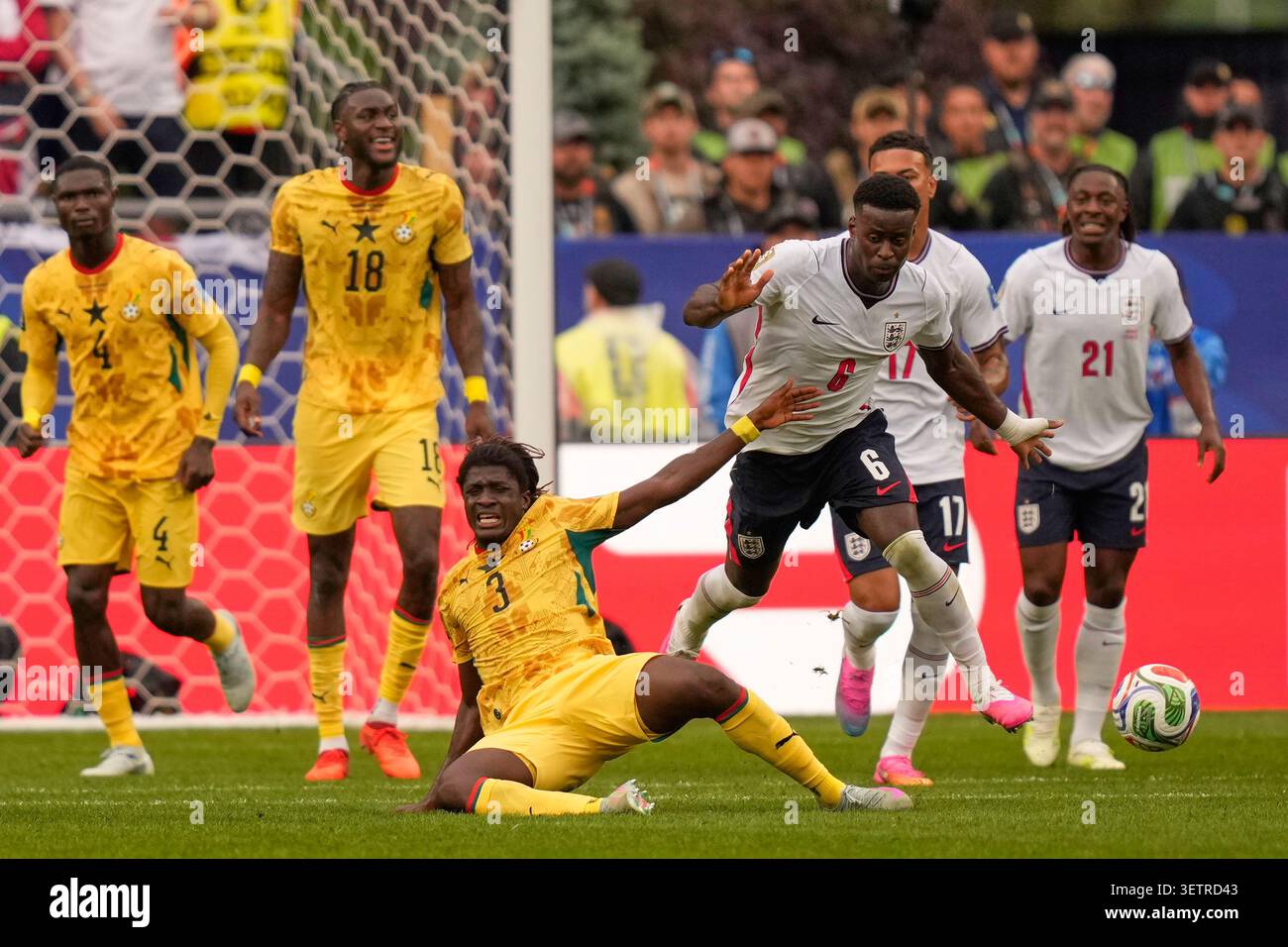 Ghana's Caleb Yirenkyi (3) and England's Marc Guehi (6) fight for the ...