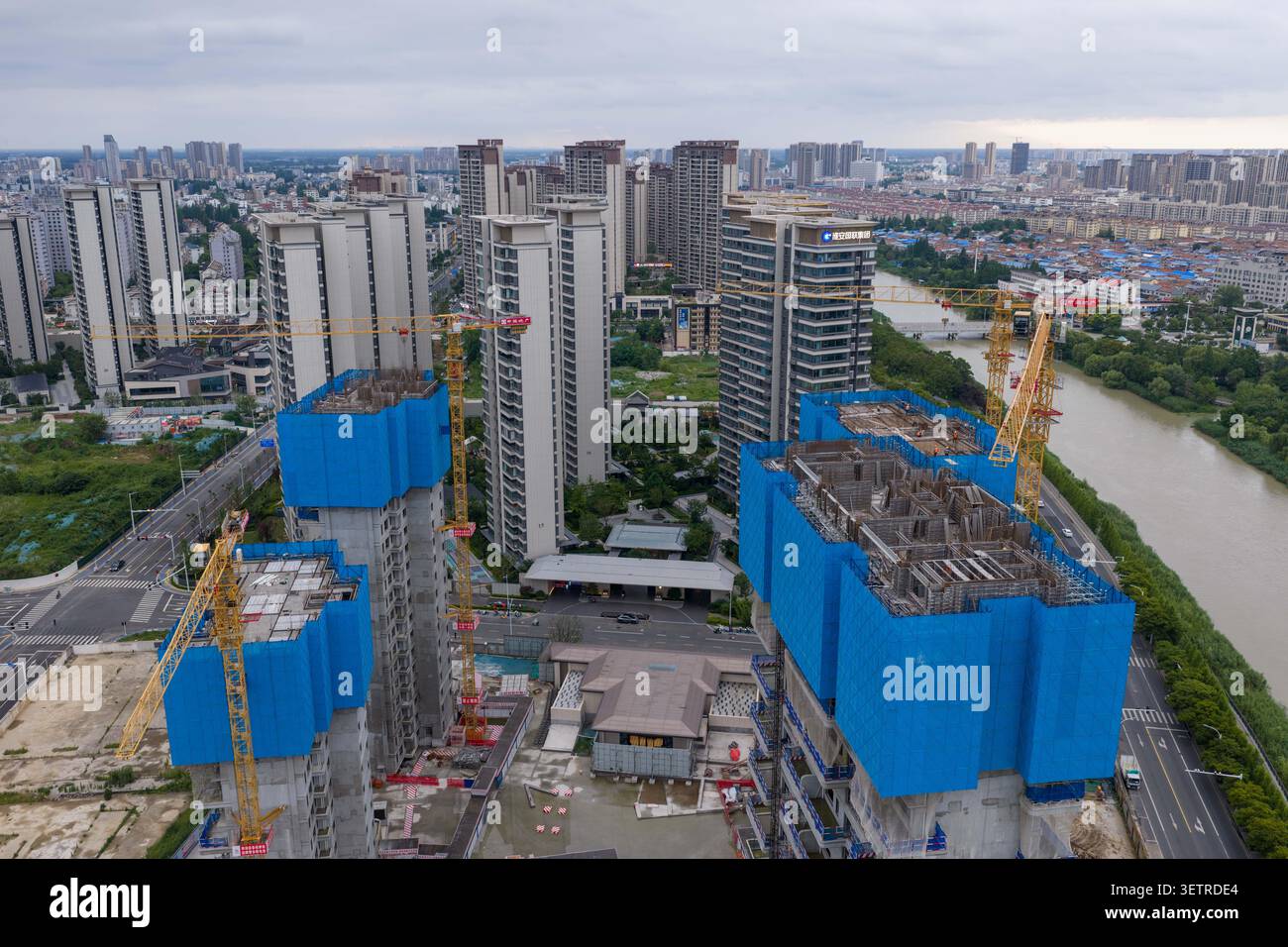 HUAI'AN, CHINA - JUNE 23, 2026 - Real estate project under construction ...
