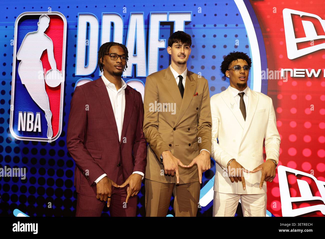 Morez Johnson Jr., from left, Aday Mara and Yaxel Lendeborg arrive for ...