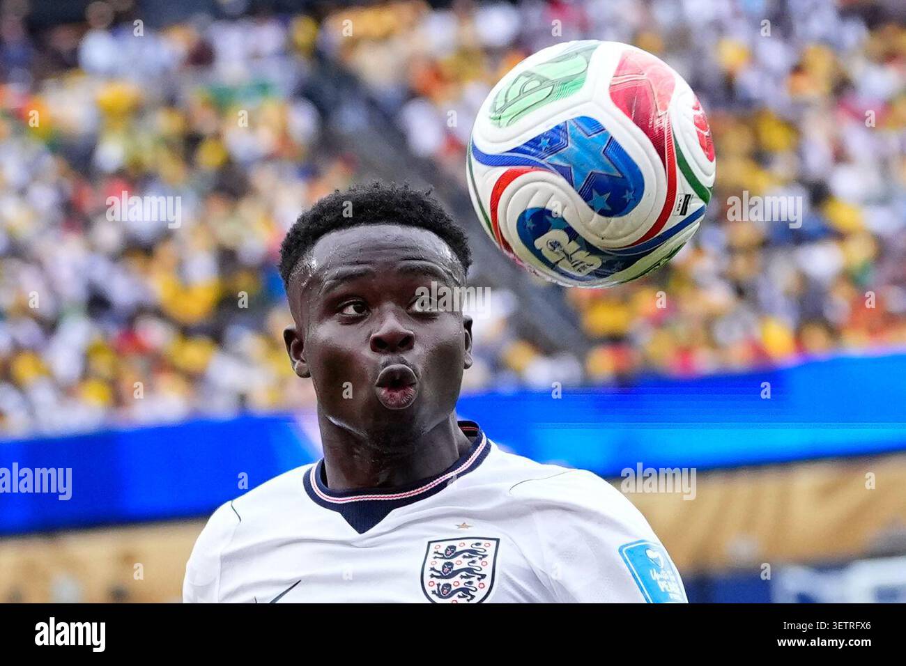 England's Bukayo Saka (7) watches his kick during the World Cup Group L ...