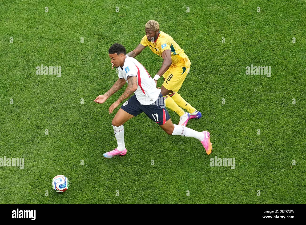 England's Morgan Rogers (left) and Ghana's Kwasi Sibo battle for the ...