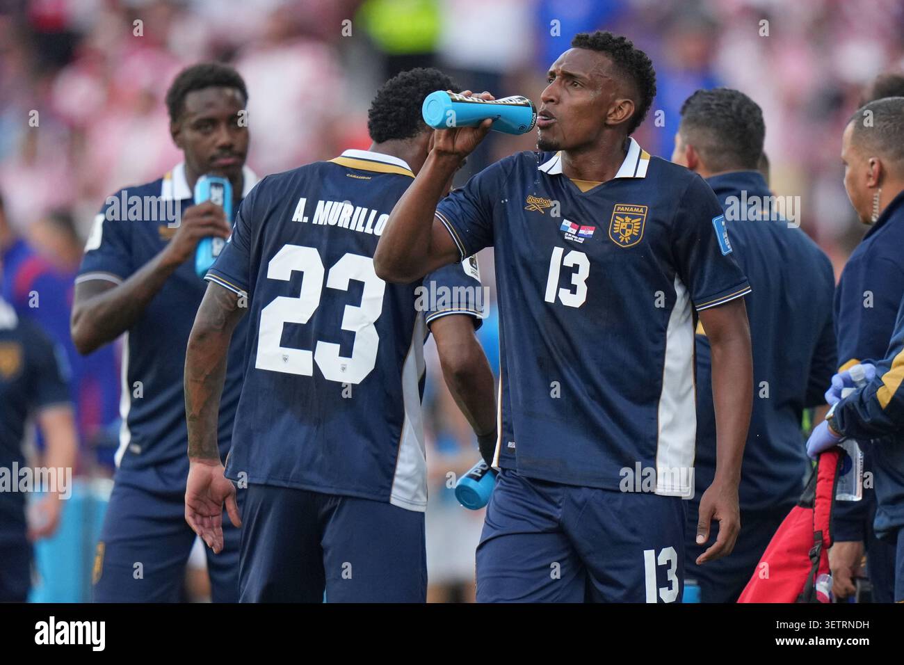 Panama's Jiovany Ramos (13) drinks water during a hydration break of ...