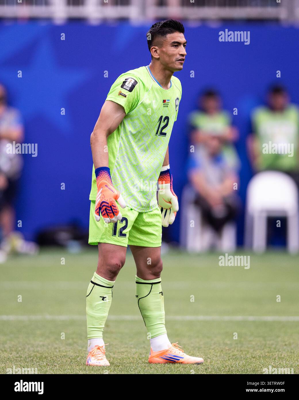 HOUSTON, TX - JUNE 23: Abduvohid Nematov #12 of Uzbekistan in action ...