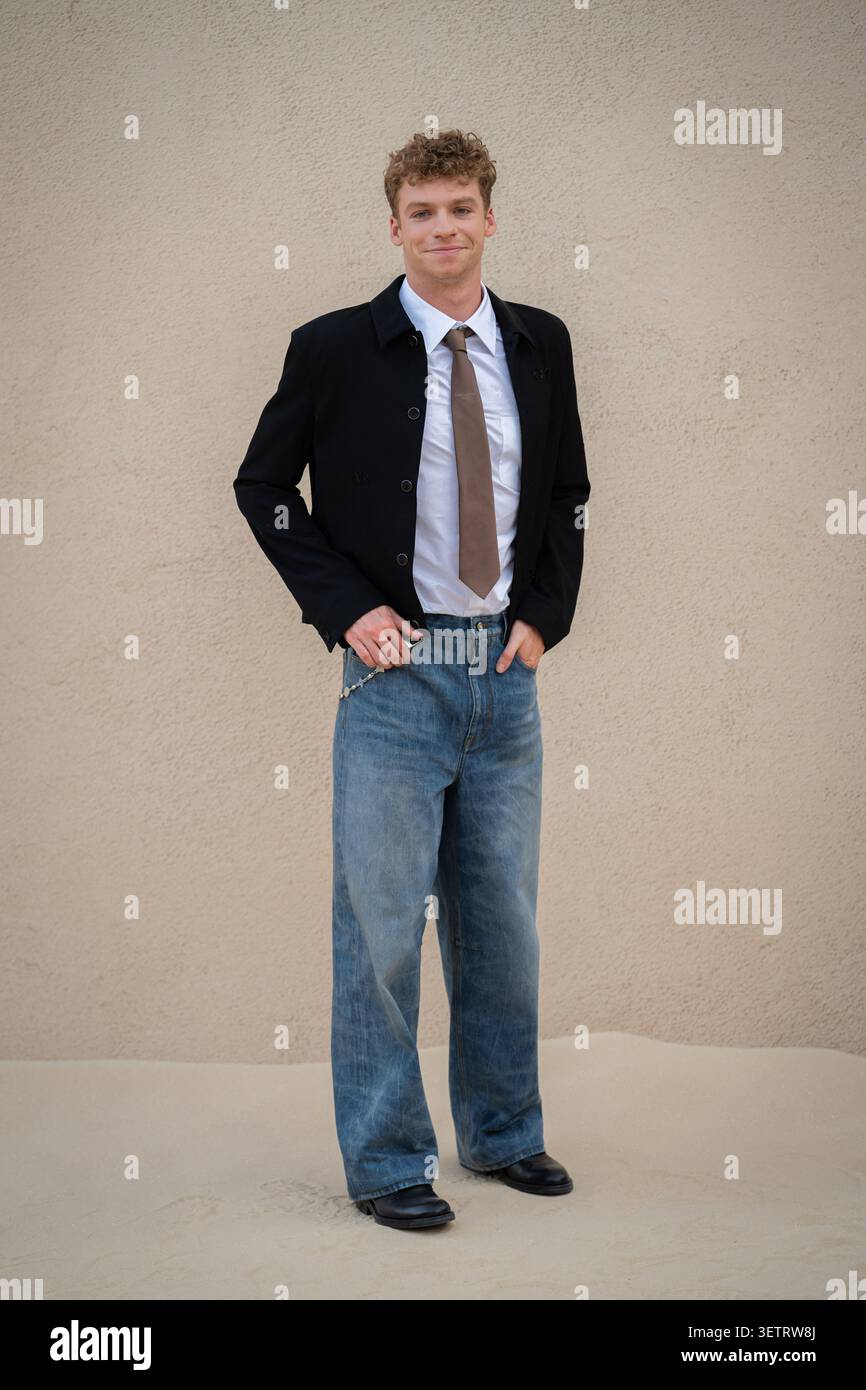 French swimmer Leon Marchand attends the Louis Vuitton show during ...