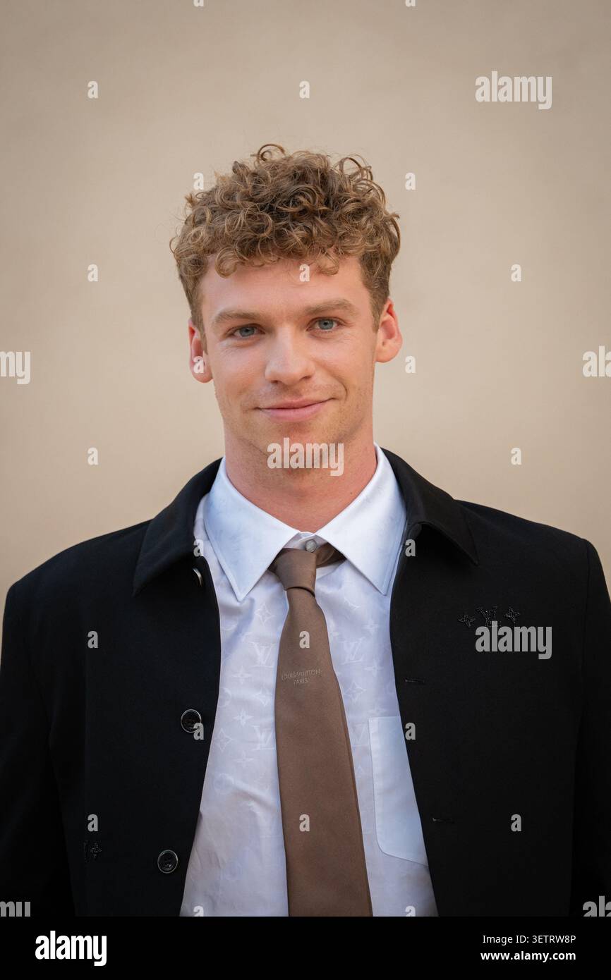 French swimmer Leon Marchand attends the Louis Vuitton show during ...