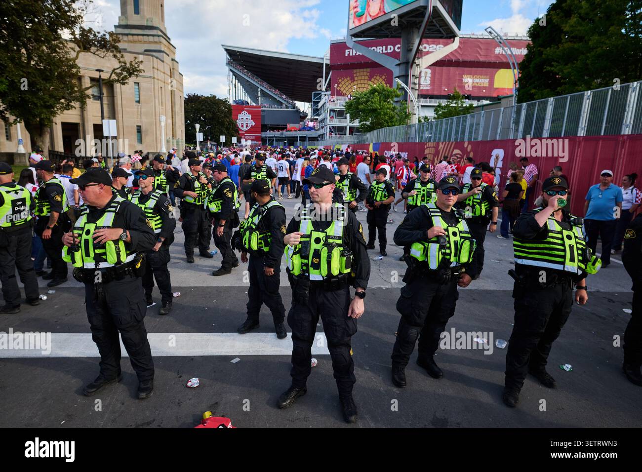 Croatia fans pass by police as as they approach Toronto Stadium before ...