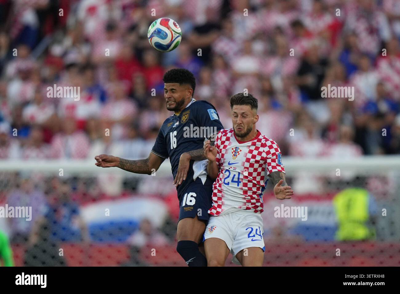Panama's Andres Andrade (16) and Croatia's Marco Pasalic (24) jump for ...