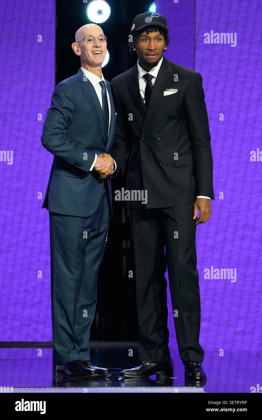 Darryn Peterson, right, poses for a photo with NBA Commissioner Adam ...