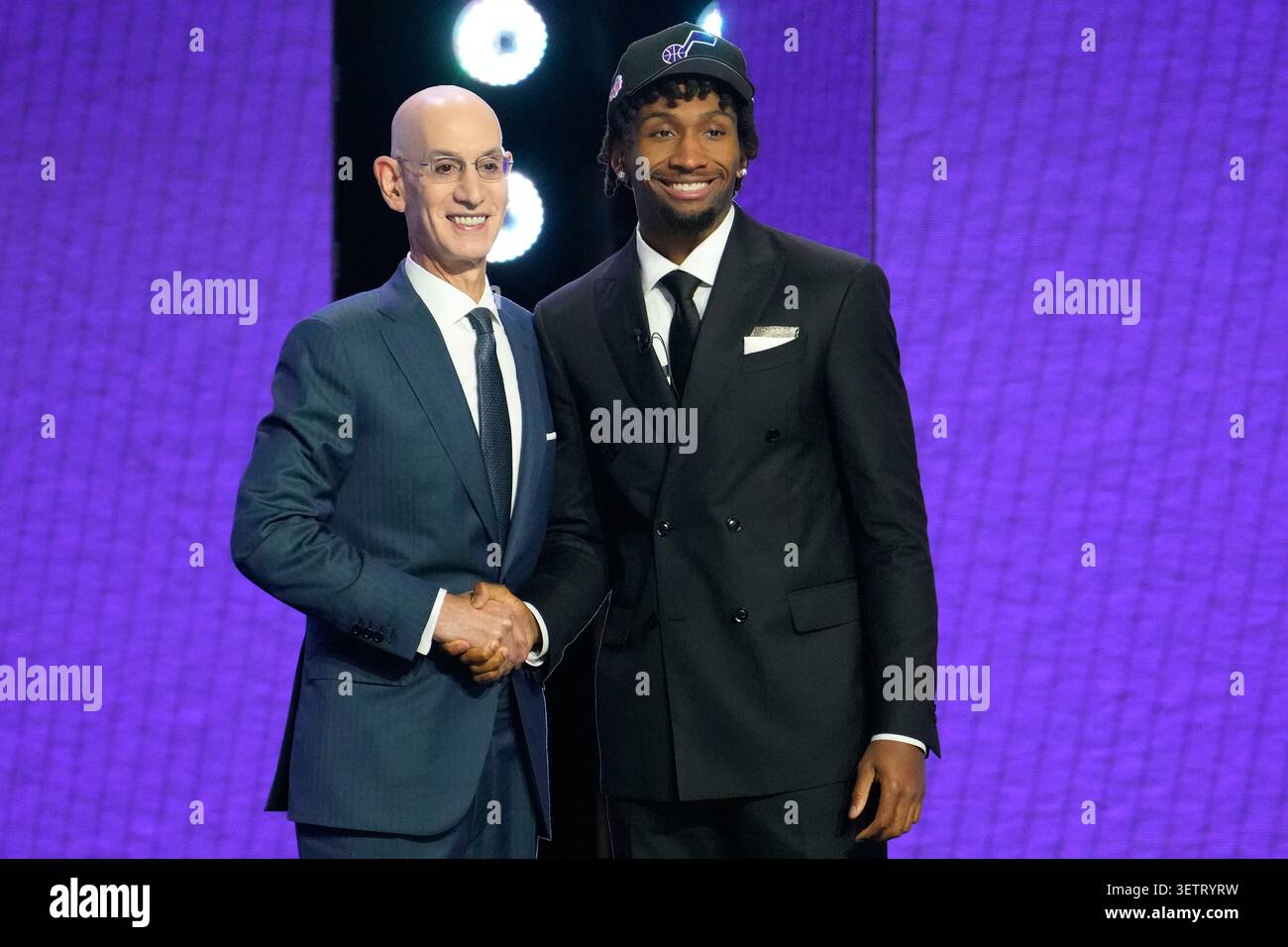 Darryn Peterson, right, poses for a photo with NBA Commissioner Adam ...