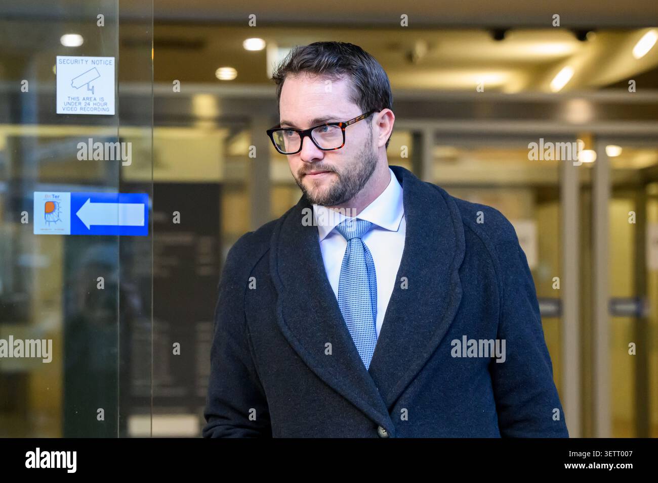 Bobby Hill, solicitor for David Warner, departs the John Madison Tower ...