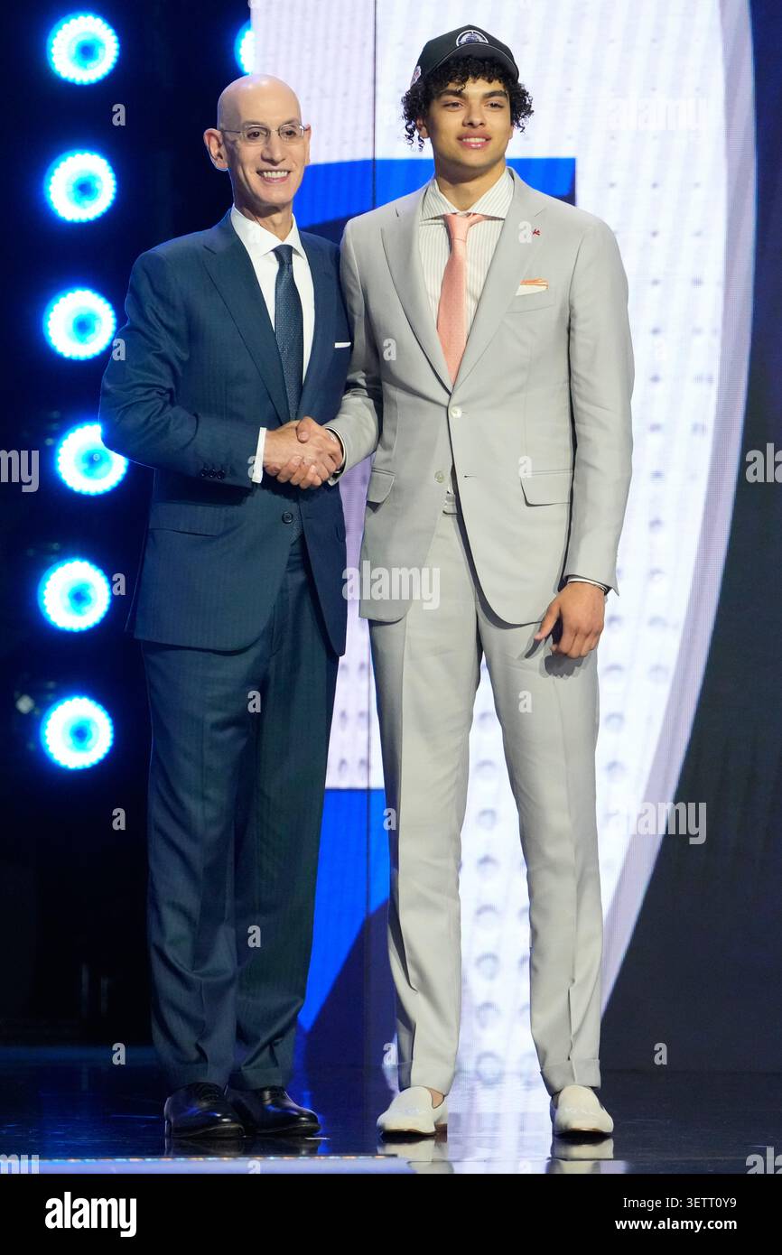 Keaton Wagler, right, poses for a photo with NBA Commissioner Adam ...