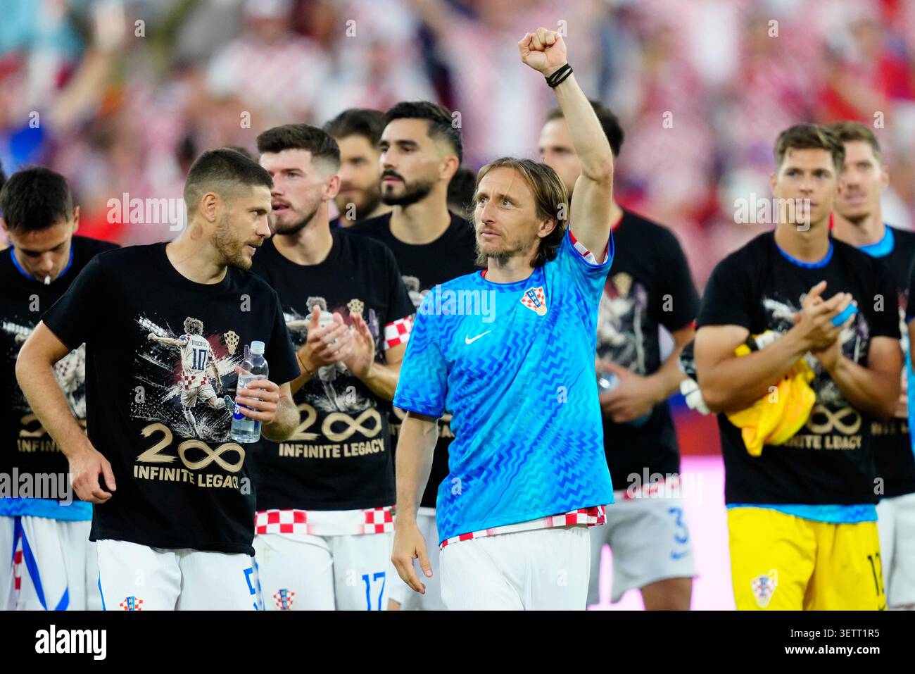 Croatia's Luka Modric (10) holds his fist up toward the crowd after ...