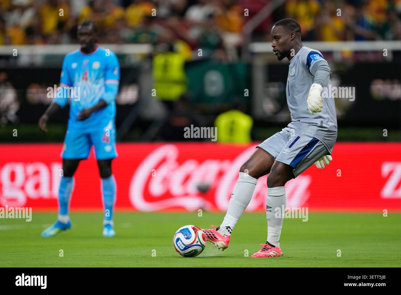Congo goalkeeper Lionel Mpasi (1) kicks the ball during the World Cup ...
