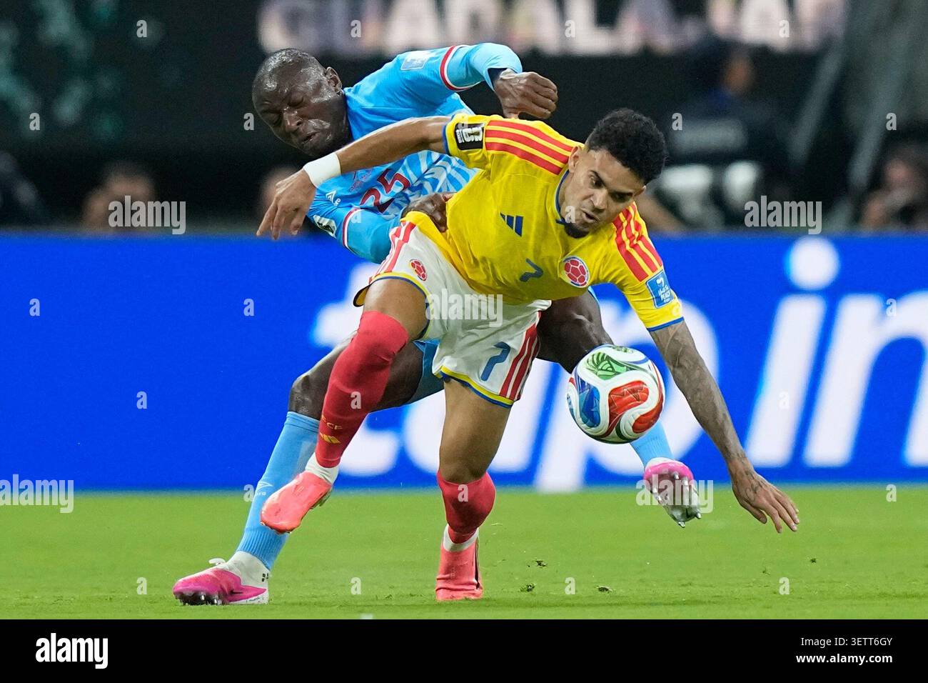 Colombia's Luis Diaz (7) challenges for the ball with Congo's Edo ...