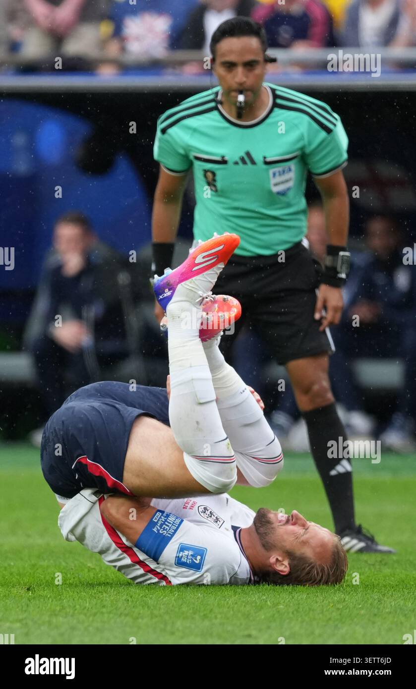 England's Harry Kane (9) takes a tumble during the World Cup Group L ...