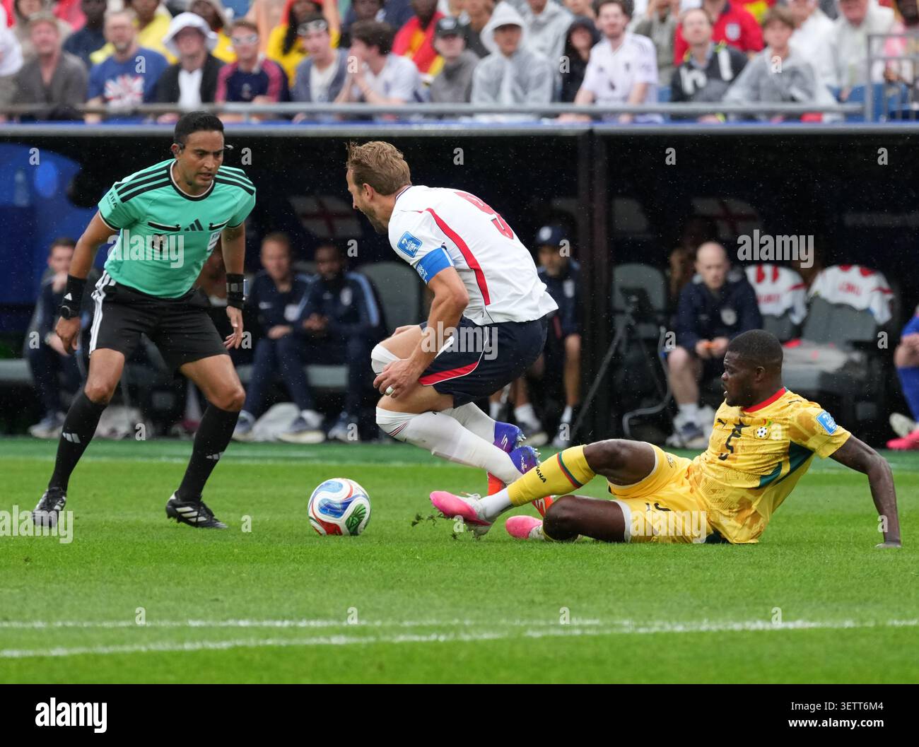 Ghana's Thomas Partey (5) fouls England's Harry Kane (9) during the ...