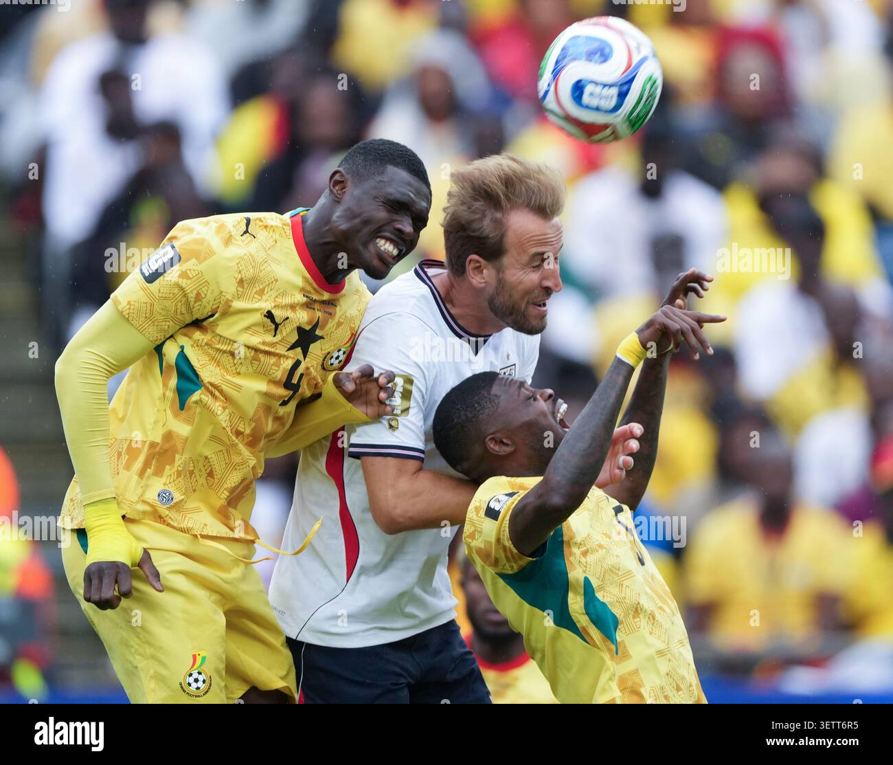 England's Harry Kane (9) wins header against Ghana's Thomas Partey (5 ...