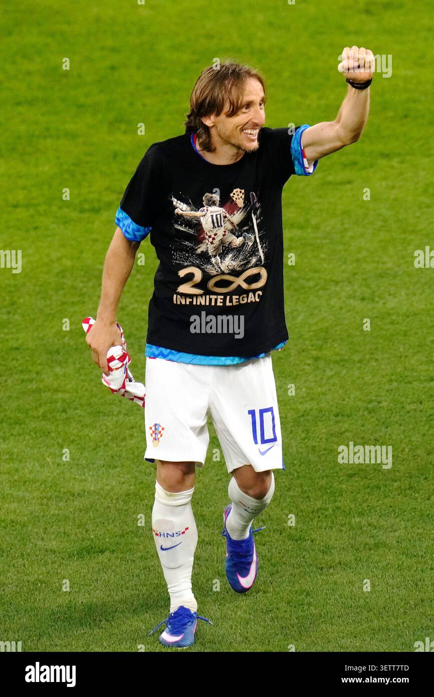 Croatia's Luka Modric wears a shirt honouring his 200th appearance for ...