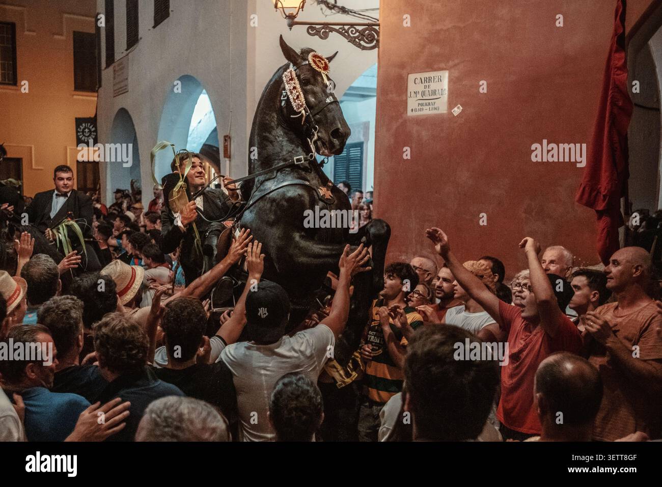 Ciutadella, Spain. 23 June, 2026: A 'caixer' (horse rider) enters up on ...