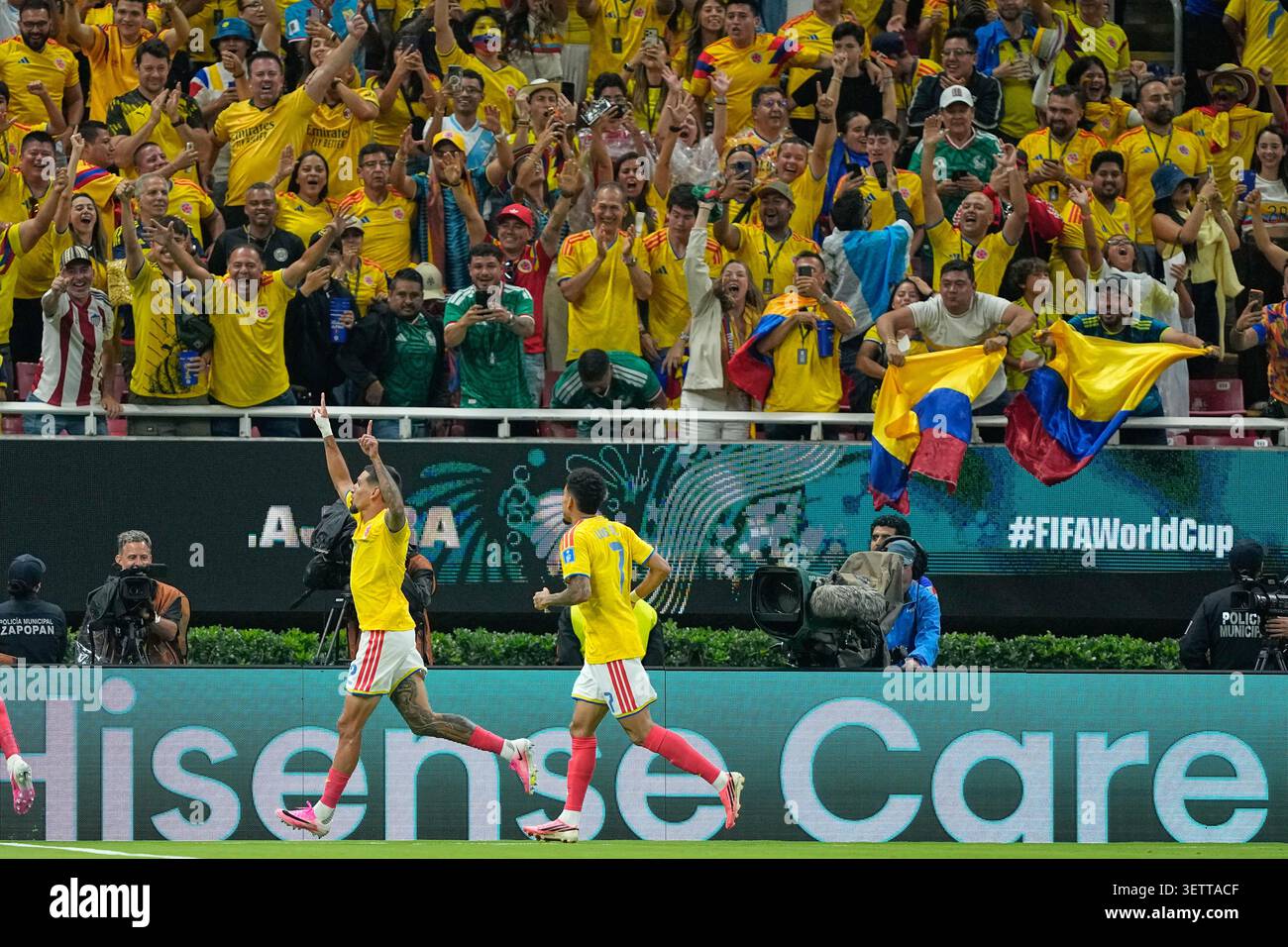 Colombia's Daniel Munoz, left, celebrates after scoring his team's ...