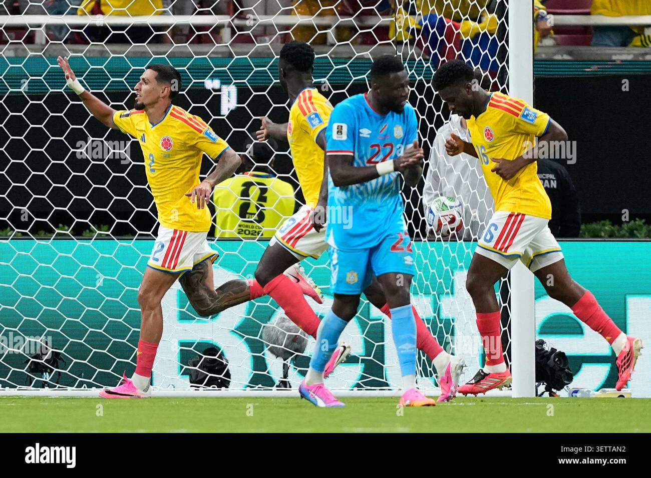 Colombia's Daniel Munoz, left, celebrates after scoring his team's ...