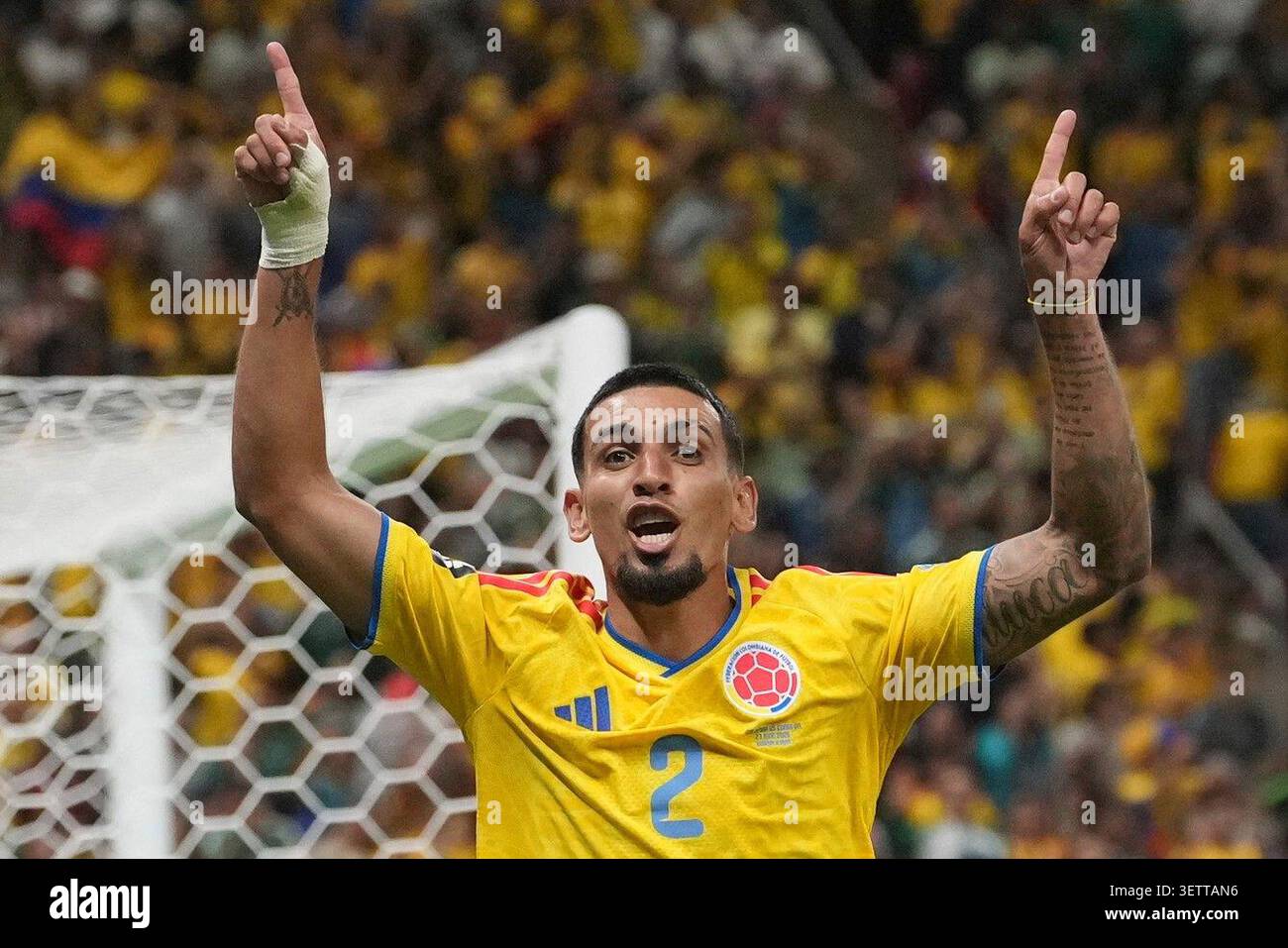 Colombia's Daniel Munoz (2) celebrates after scoring his side's opening ...