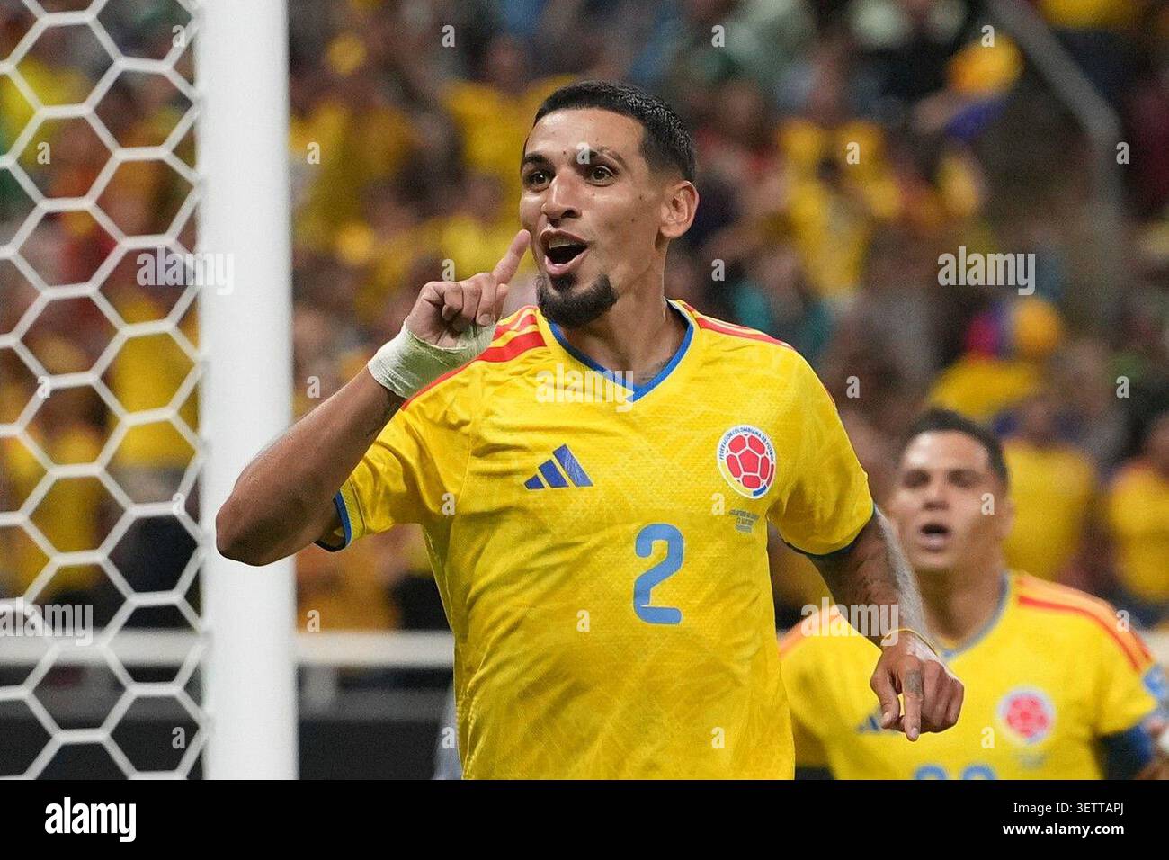 Colombia's Daniel Munoz (2) celebrates after scoring his side's opening ...