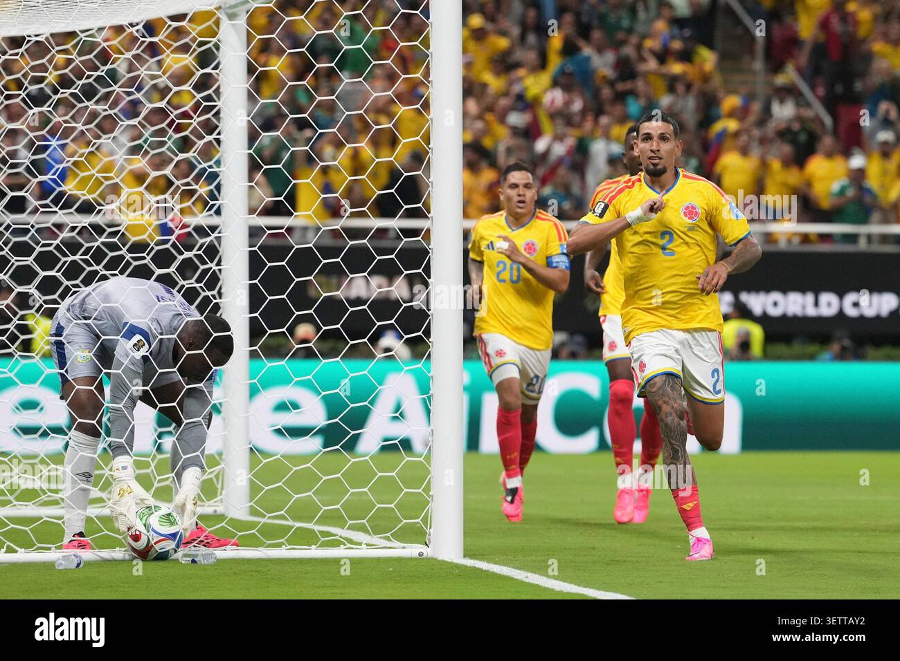 Colombia's Daniel Munoz (2) celebrates after scoring his side's opening ...