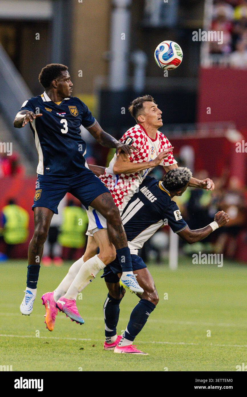 Ante Budimir of Croatia contests a header with José Córdoba of Panama ...