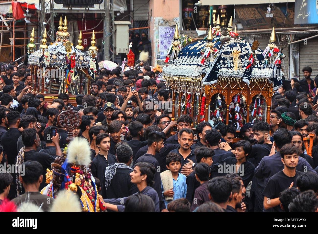Shiite Muslims carry replicas locally called "Tazia" during a ...
