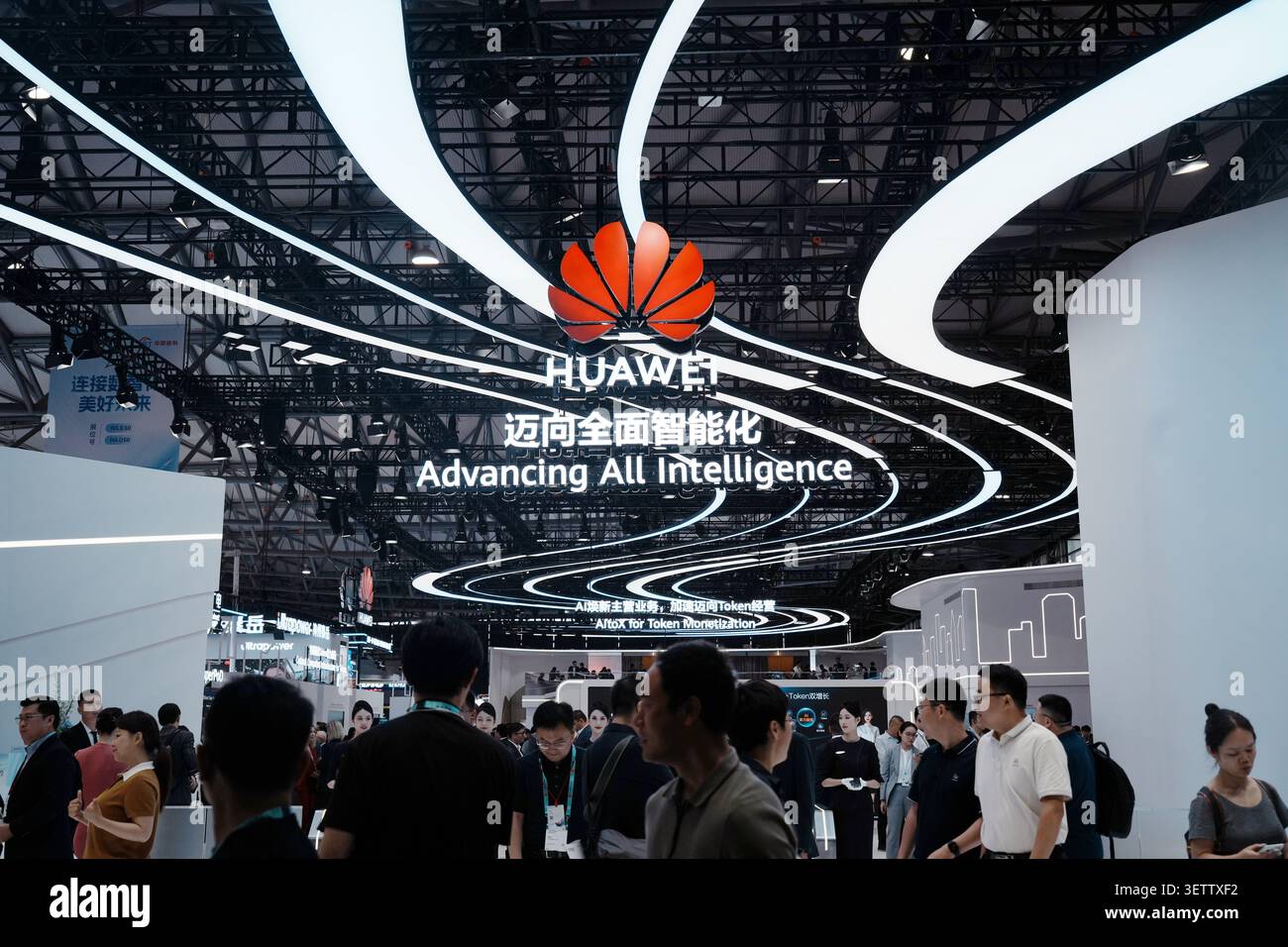 Visitors stop by the booth or Huawei during the MWC26 in Shanghai ...