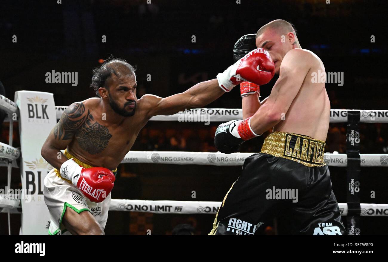 Shamal Ram Anuj (left) in action against Vegas Larfield (right) during ...