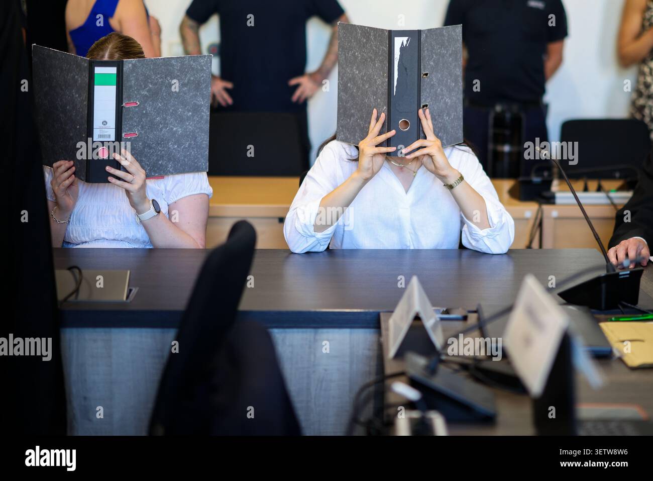 24 June 2026, North Rhine-Westphalia, Duisburg: Two policewomen on ...