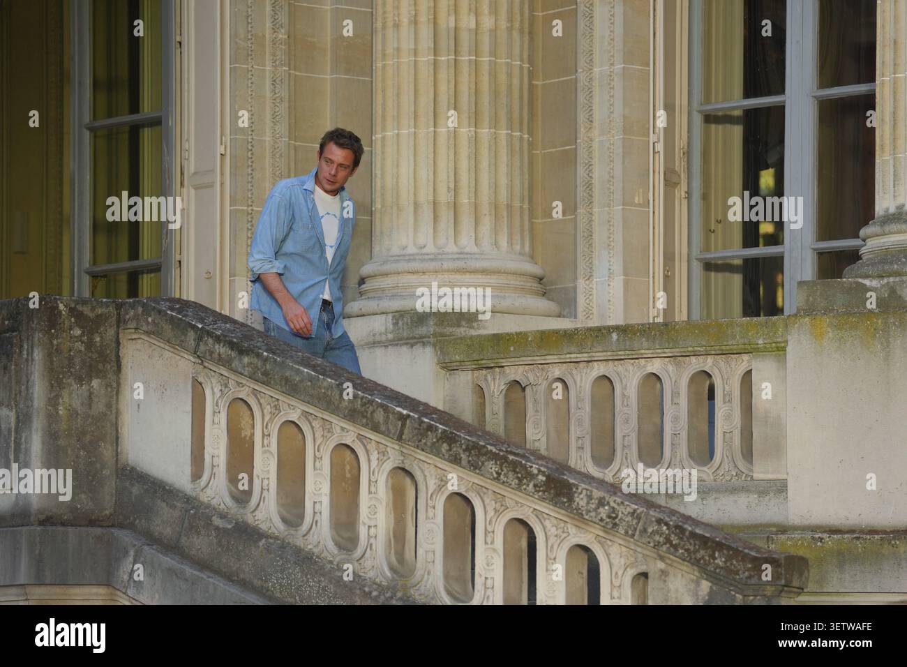 Designer Jonathan Anderson accepts applause after the Dior Homme Spring ...