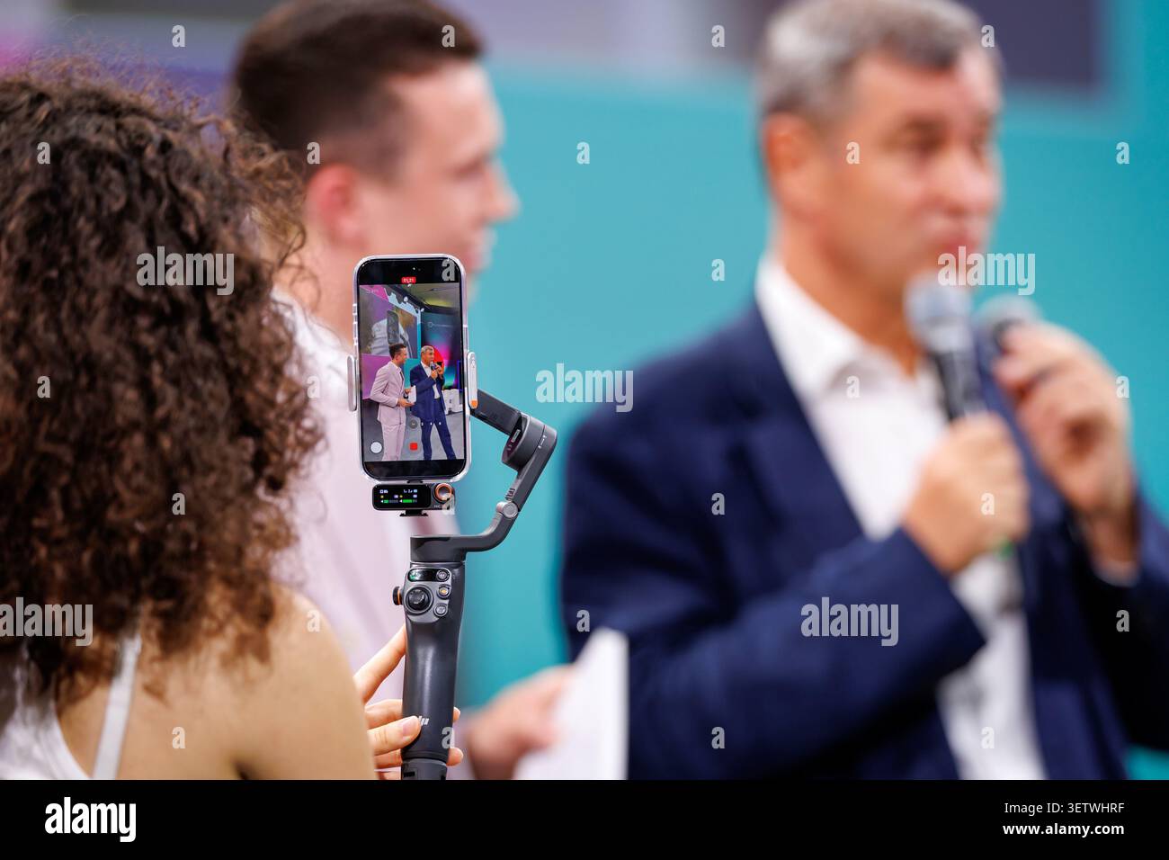 24 June 2026, Bavaria, Nuremberg: Markus Söder (right, CSU), Minister ...