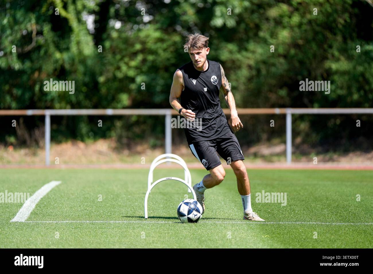 Tim Korzuschek (SVS, 18, new signing), in possession of the ball, cut ...